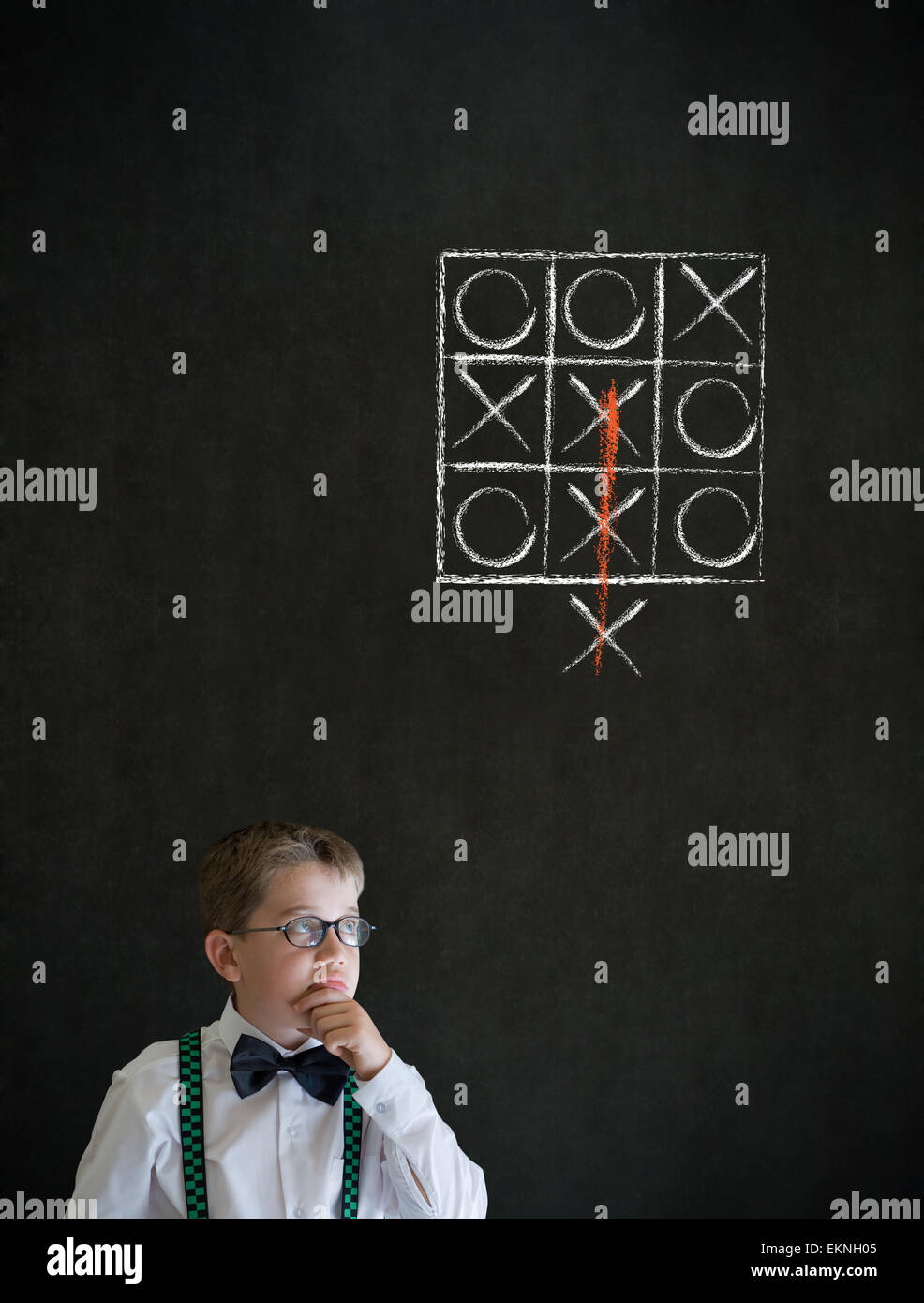 Thinking boy business man with thinking out of the box tic tac toe ...
