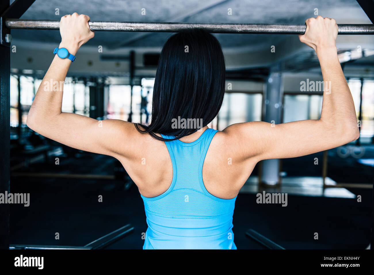 Back view portrait of a woman working out at gym Stock Photo - Alamy