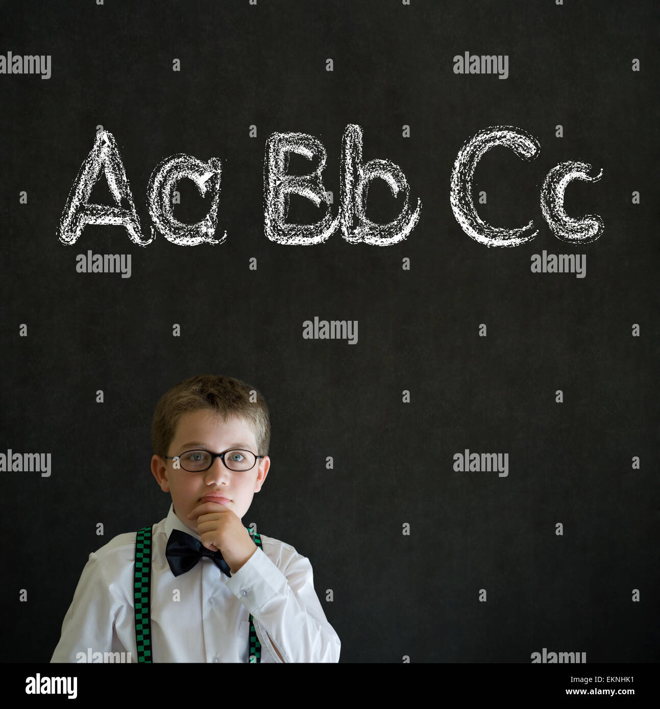 Thinking boy business man with learn English language alphabet Stock ...