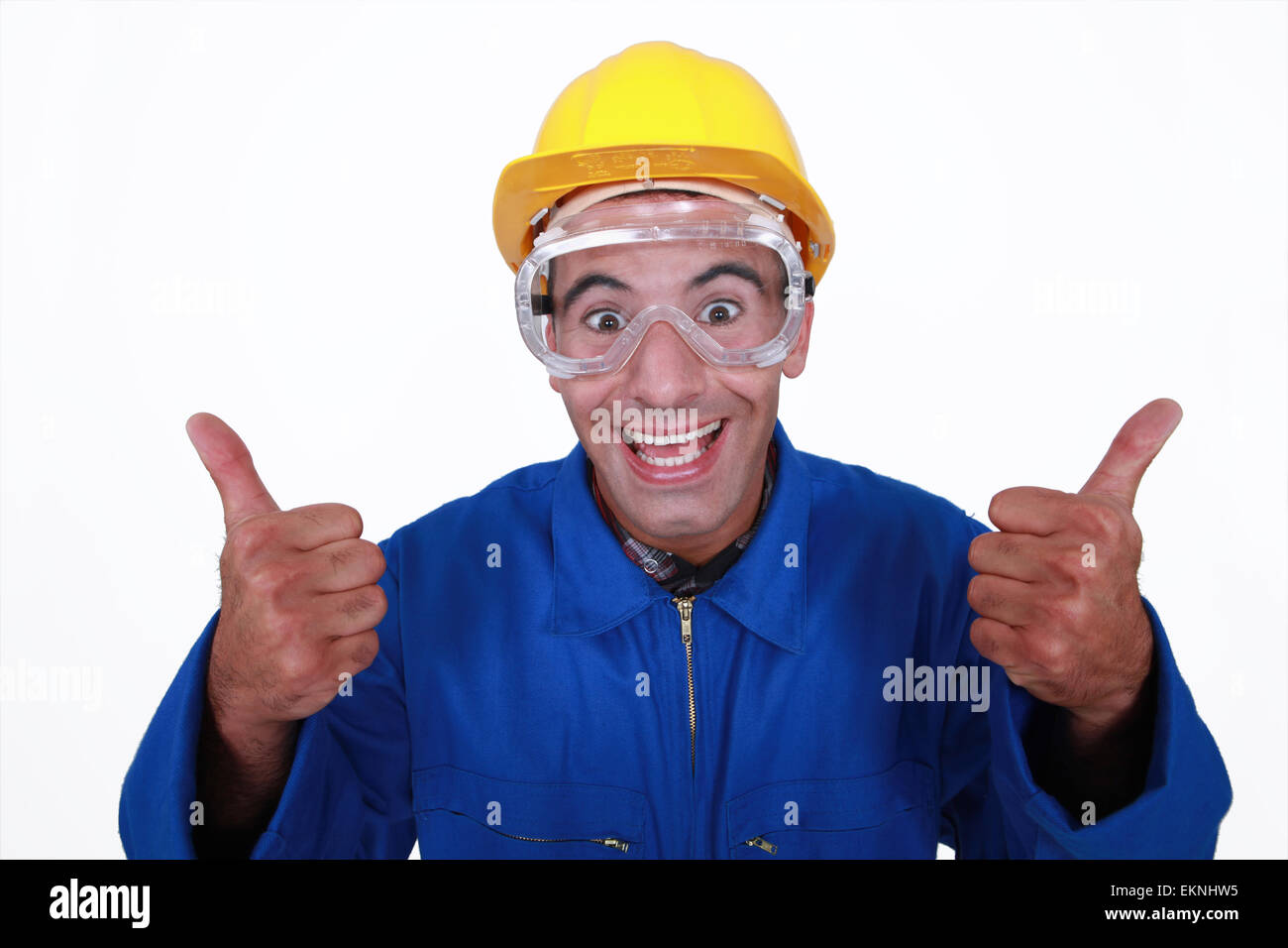 Crazy builder giving the thumbs-up Stock Photo - Alamy