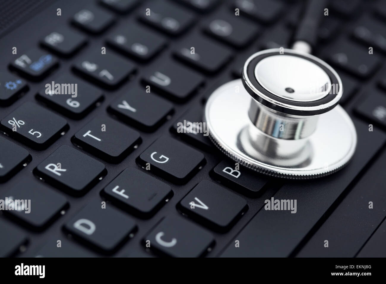 medical stethoscope on computer keyboard Stock Photo - Alamy