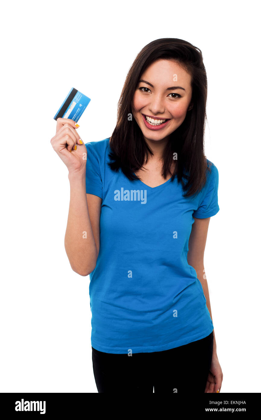 Smiling asian girl showing cash card Stock Photo - Alamy