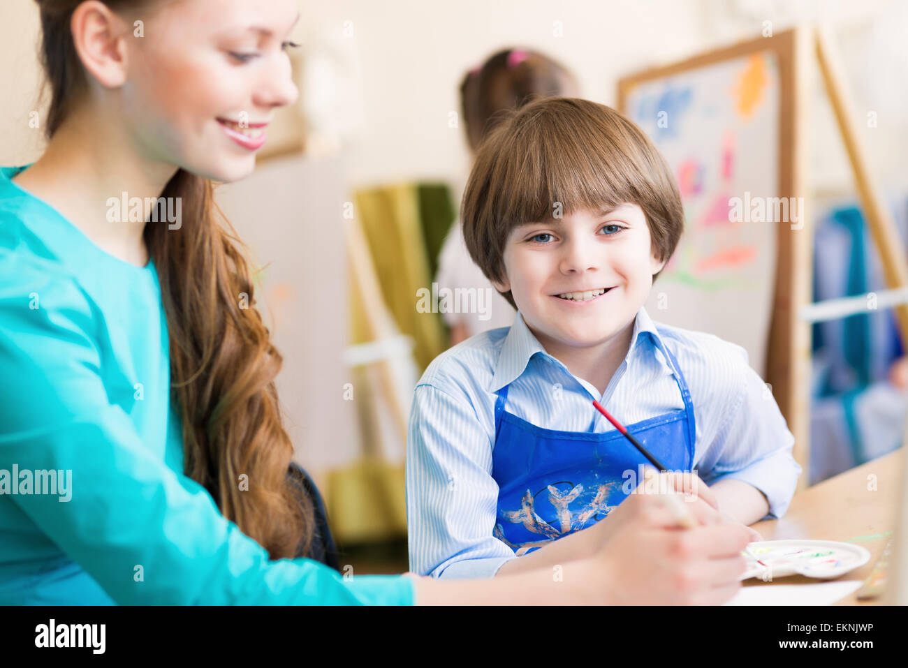 teacher and student in the classroom Stock Photo - Alamy