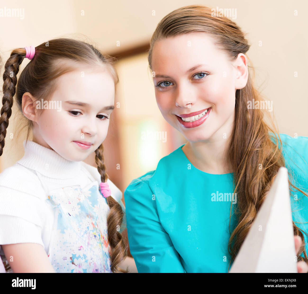 children draw with the teacher Stock Photo - Alamy