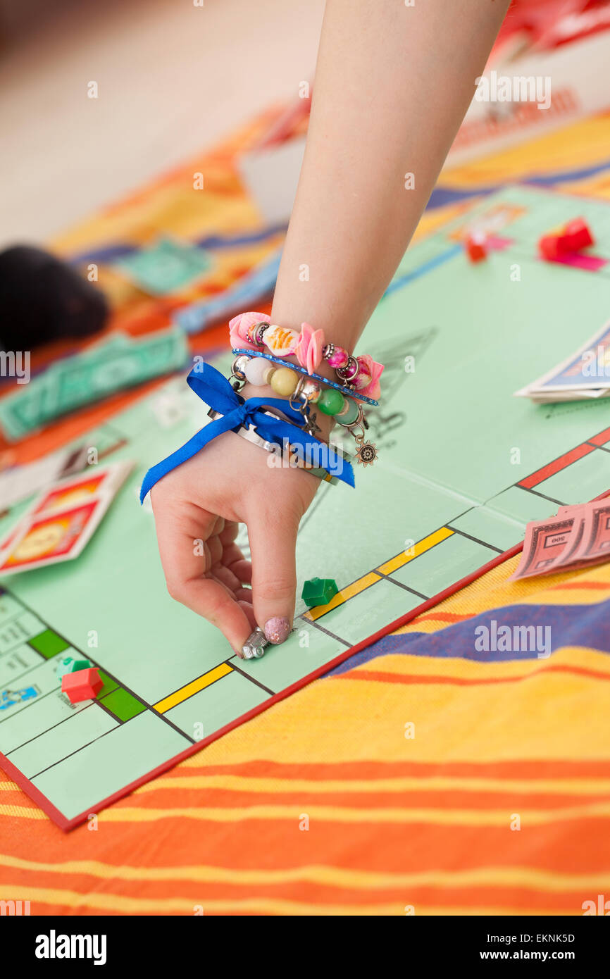 Woman hand playing a game Stock Photo - Alamy