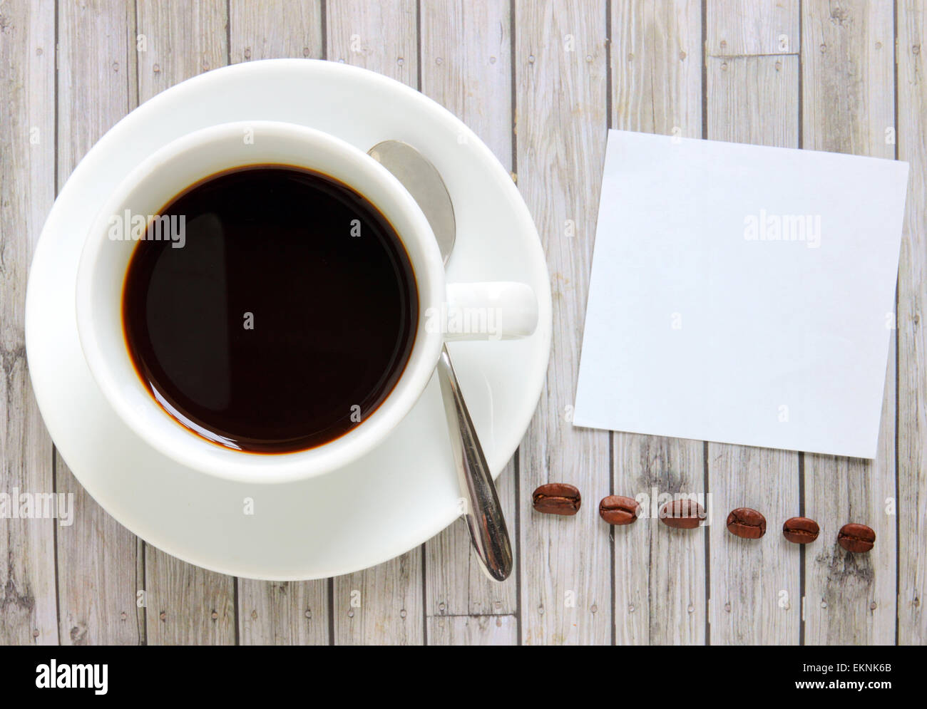 Blank paper with hot coffee cup and coffee beans Stock Photo - Alamy