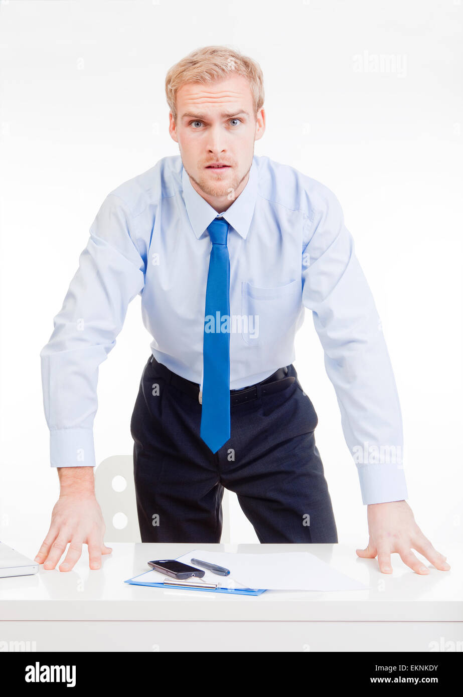 Boss sitting behind desk standing hi-res stock photography and images ...