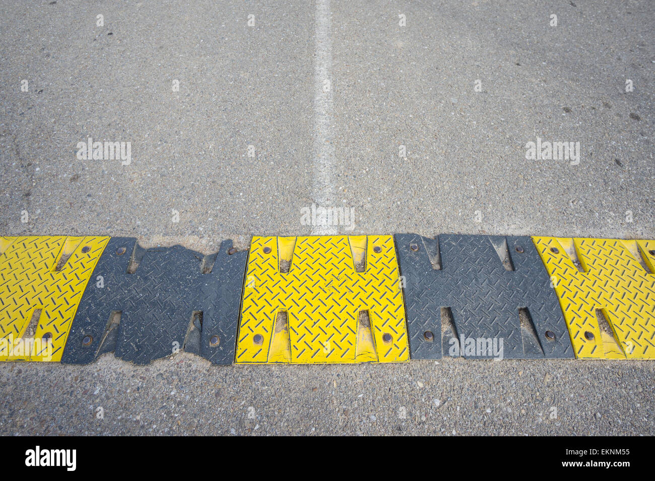 Top view of damaged band to reduce the speed of vehicles Stock Photo ...
