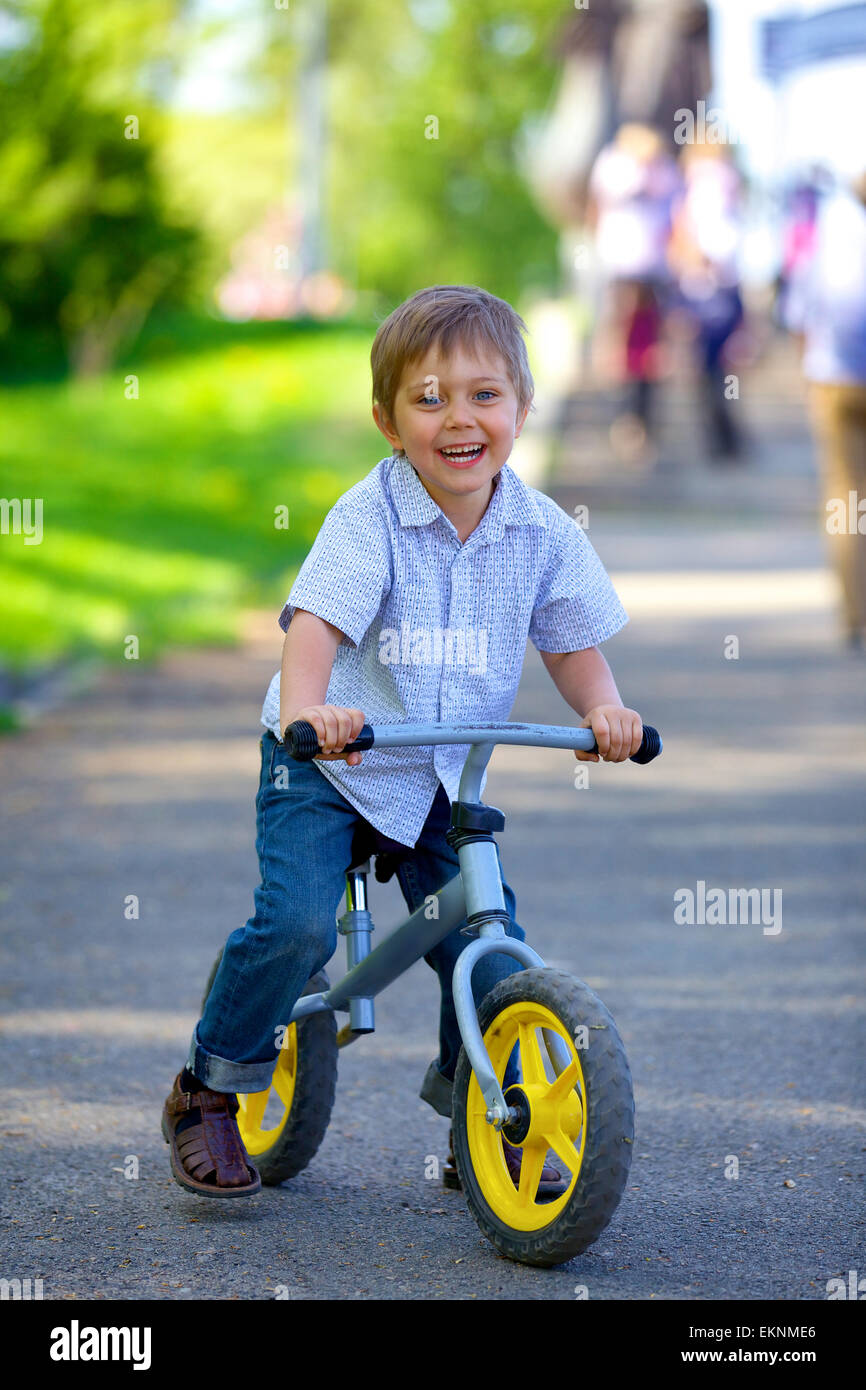 Little boy on a bicycle Stock Photo - Alamy