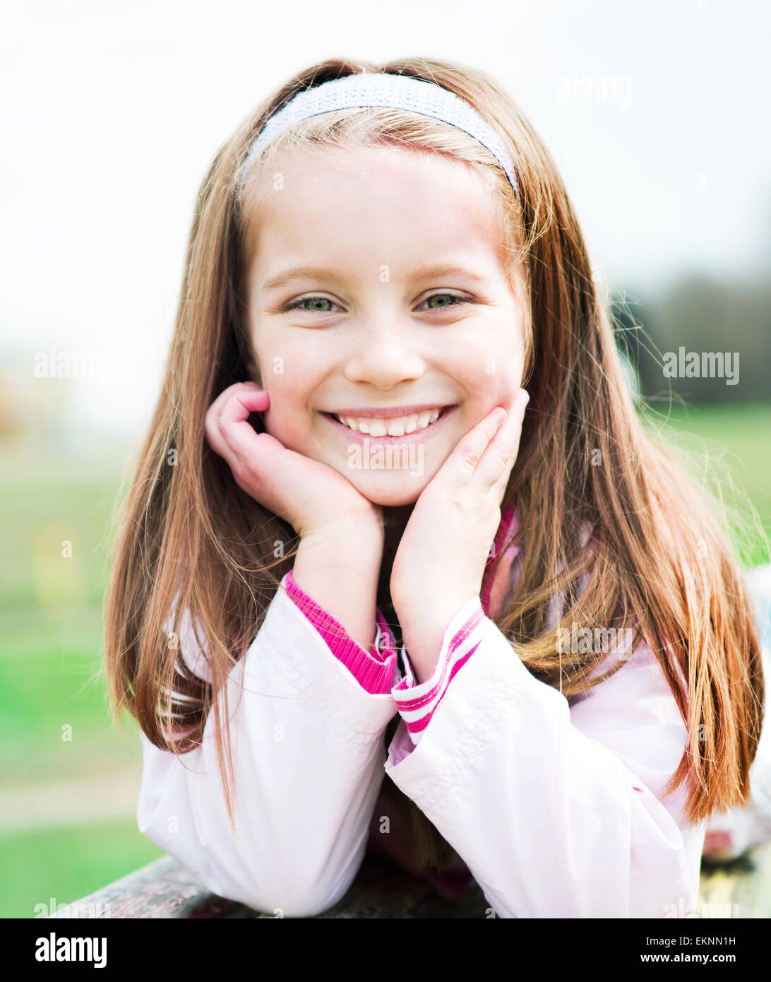 portrait of a happy liitle girl Stock Photo - Alamy