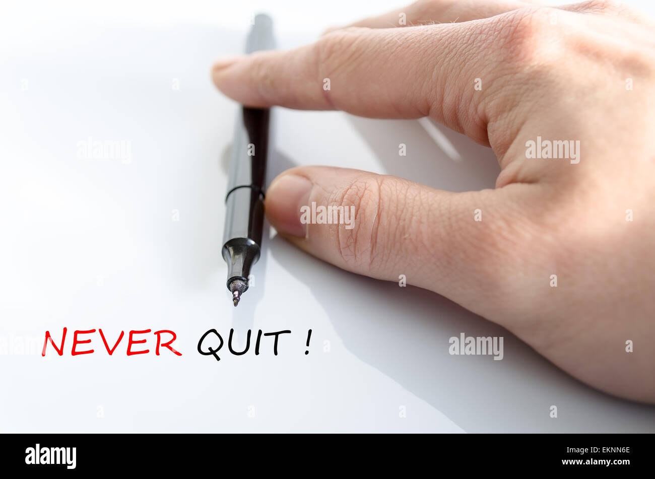 Never Quit Concept Isolated Over White Background Stock Photo - Alamy