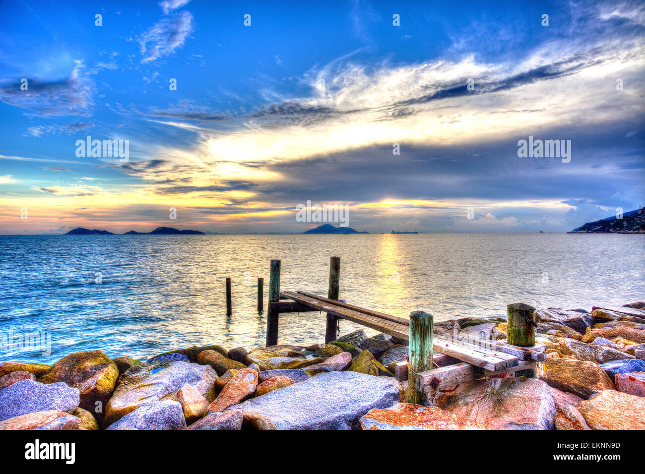 Sunset at pier Stock Photo - Alamy
