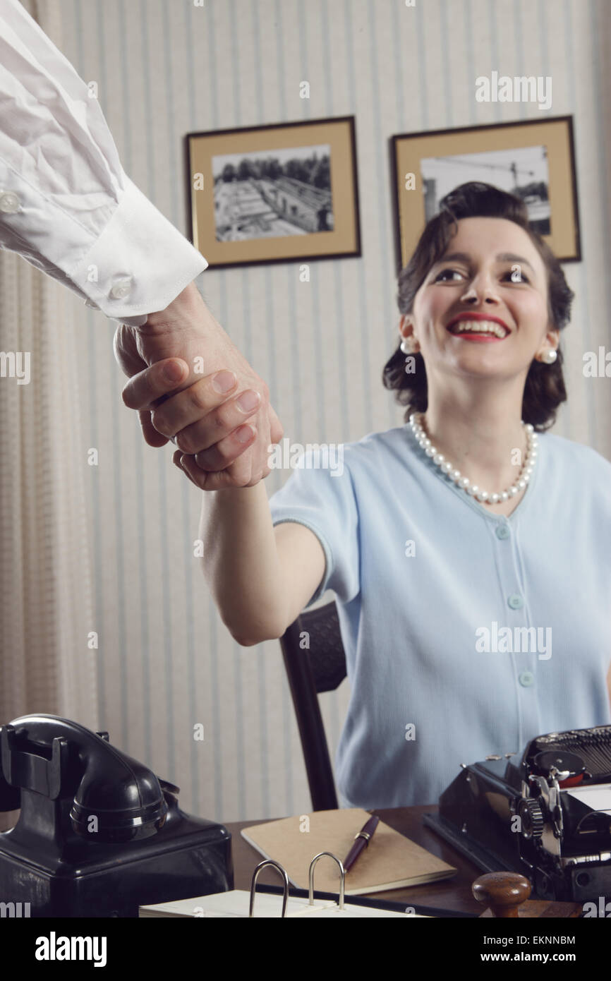 Woman handshake vintage hi-res stock photography and images - Alamy