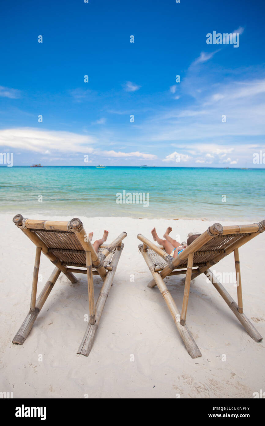 Two beach chairs on perfect tropical white sand beach in Boracay ...