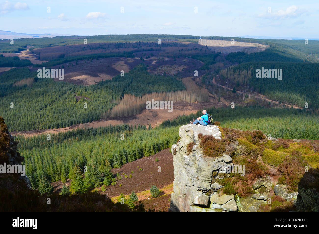 Walker on Coe Crags in Thrunton, Northumberland Stock Photo - Alamy