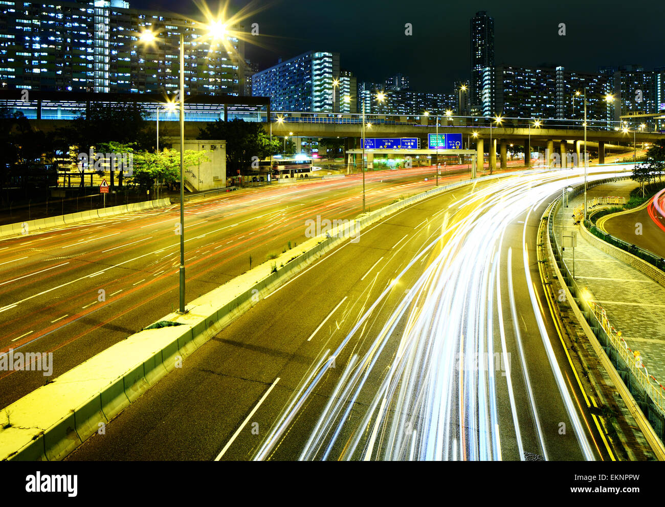 Traffic light on highway at night Stock Photo - Alamy