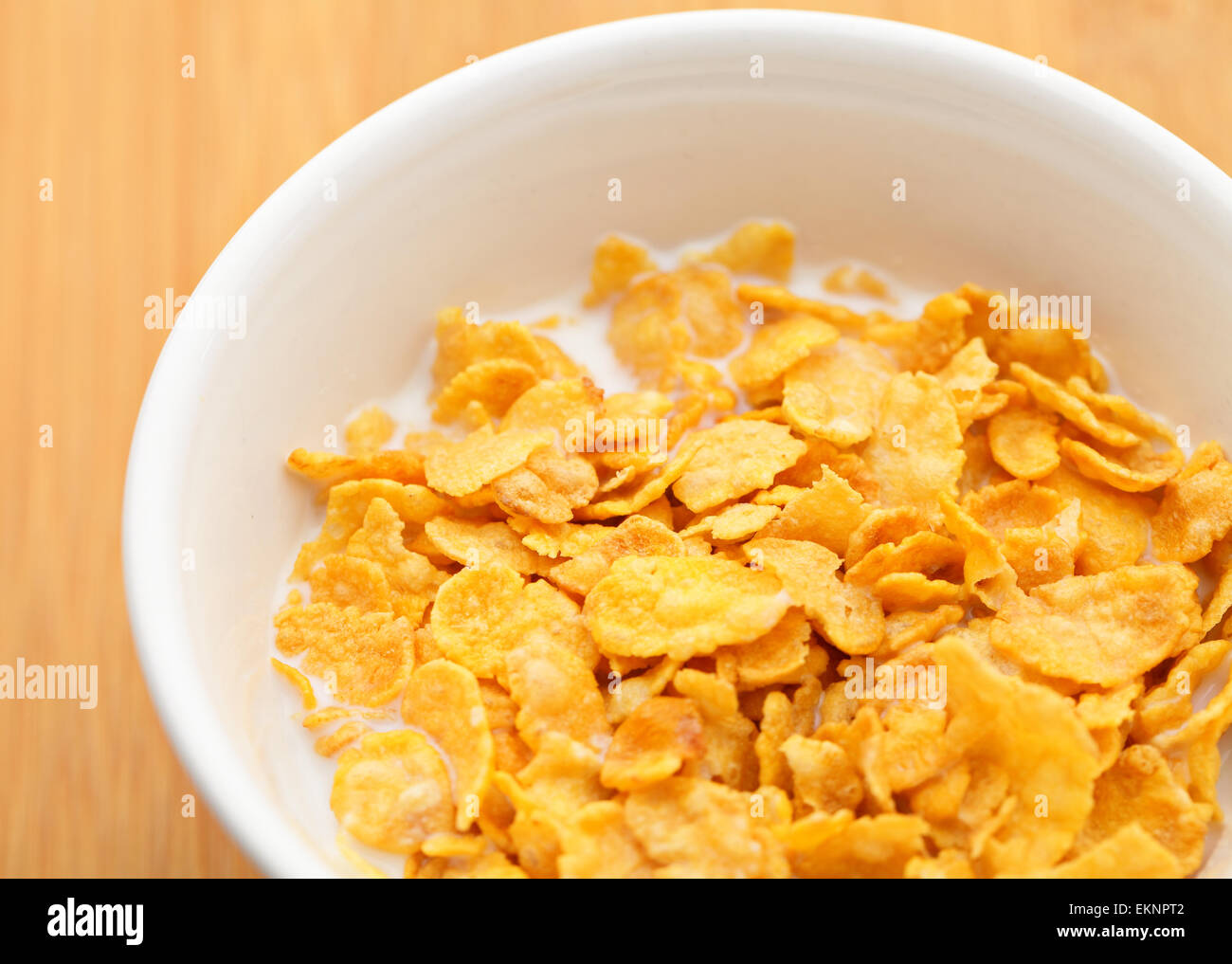 Corn flake in bowl Stock Photo - Alamy