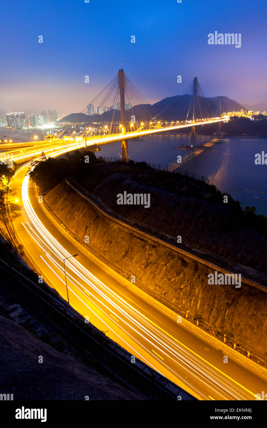 Highway and bridge at night Stock Photo - Alamy