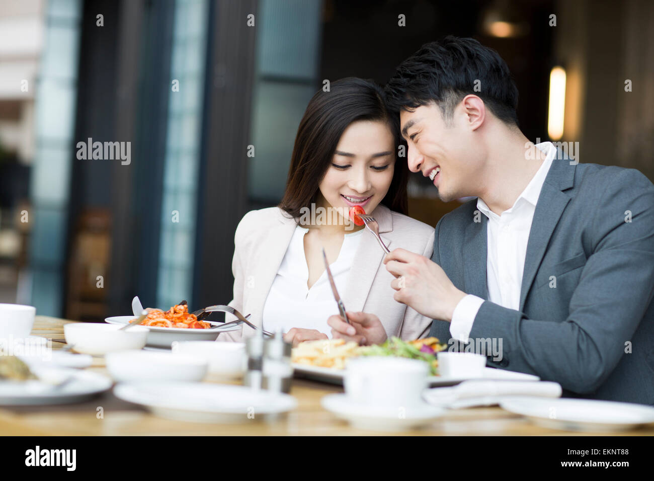 Young couple dining in restaurant Stock Photo - Alamy