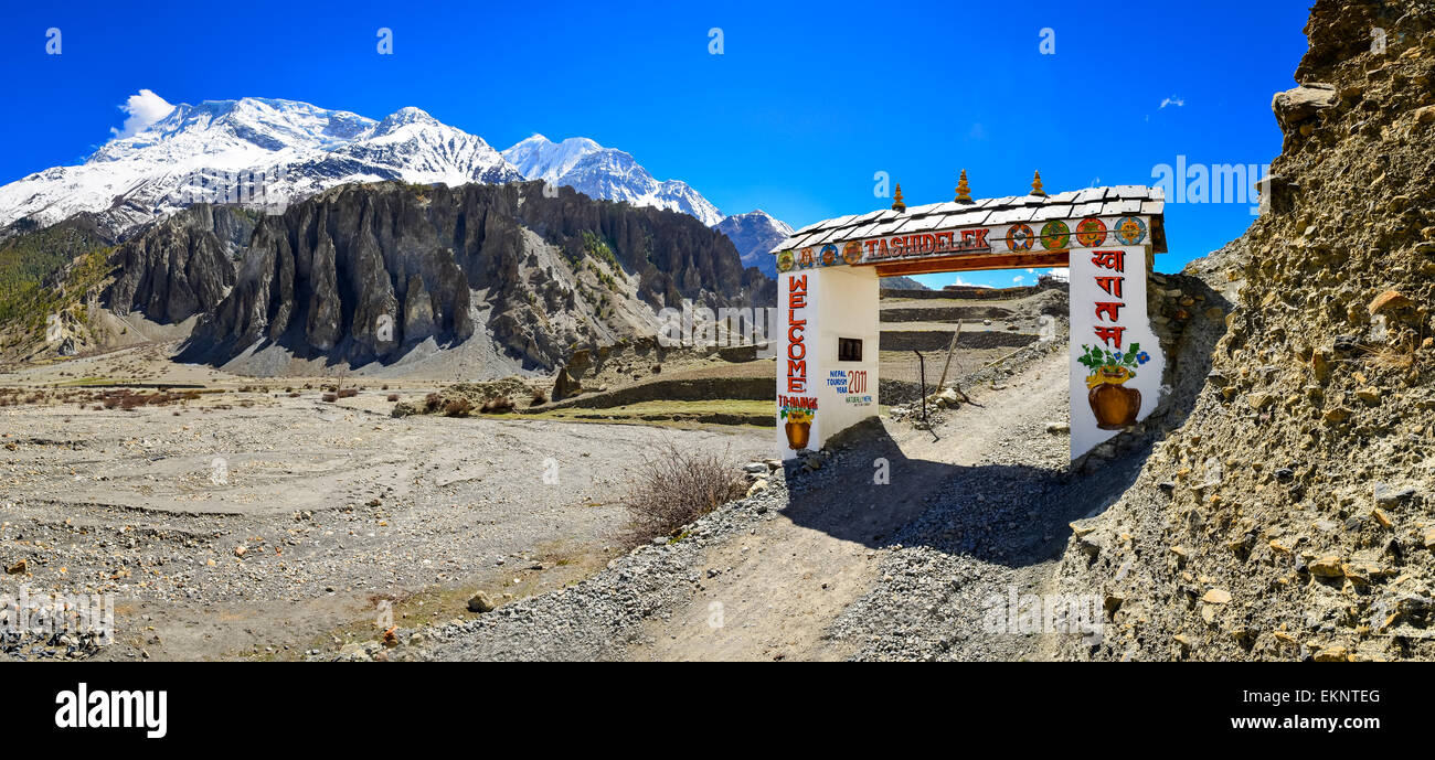 Panorama of entrance gate with welcome sign, Manang, Nepal Stock Photo ...