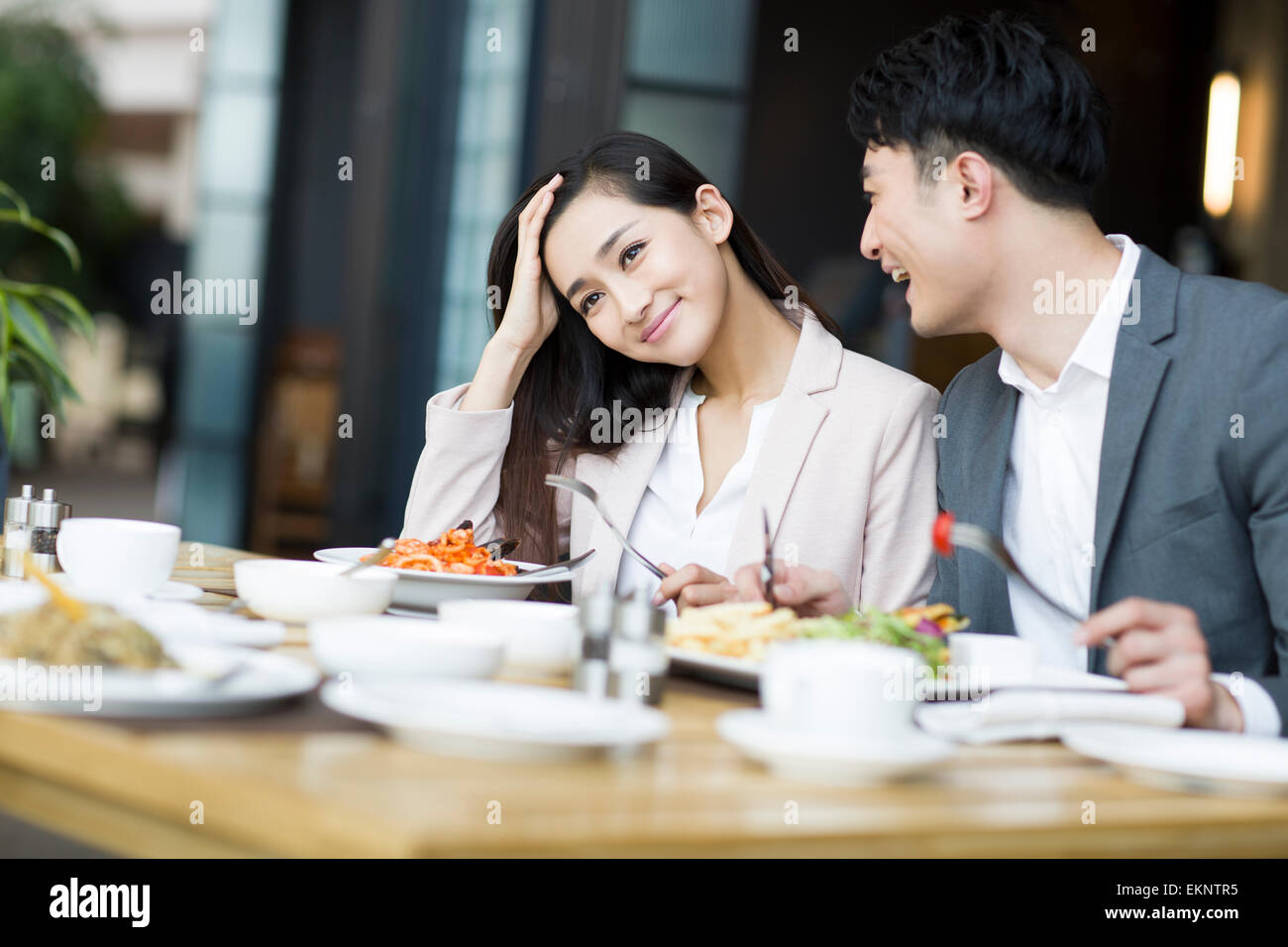 Young couple dining in restaurant Stock Photo - Alamy