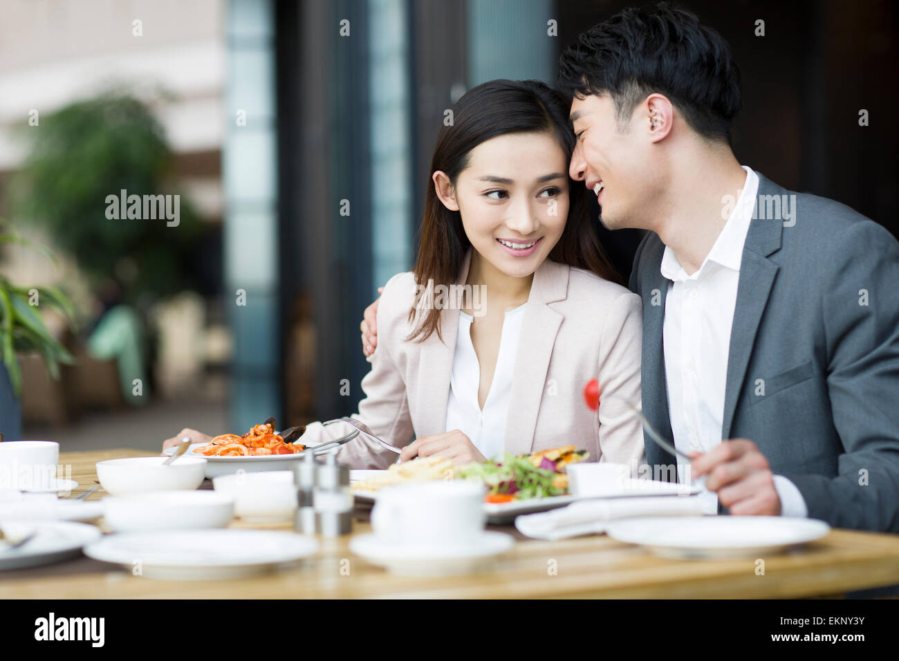 Young couple dining in restaurant Stock Photo - Alamy