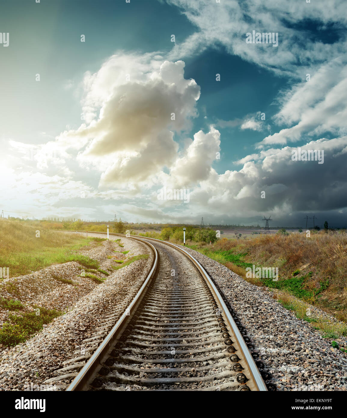 railway to horizon in sunset Stock Photo - Alamy