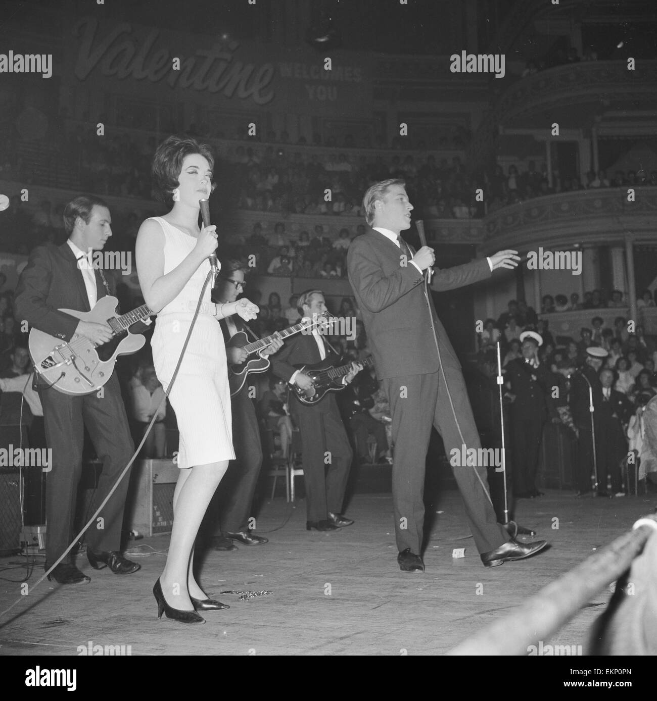 British pop singer Mike Sarne performing on stage at the Pop Prom at ...