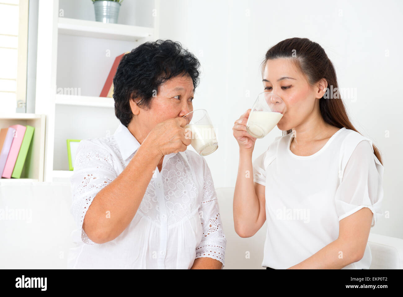 Asian senior drinking milk hi-res stock photography and images - Alamy