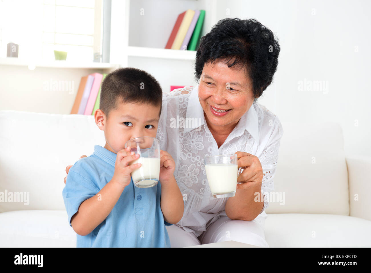 Drink milk together Stock Photo - Alamy