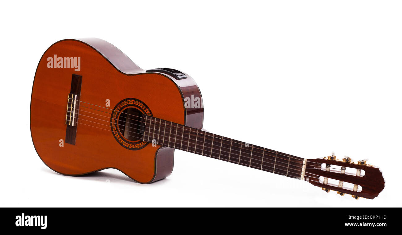 Old wooden guitar isolated over background Stock Photo - Alamy