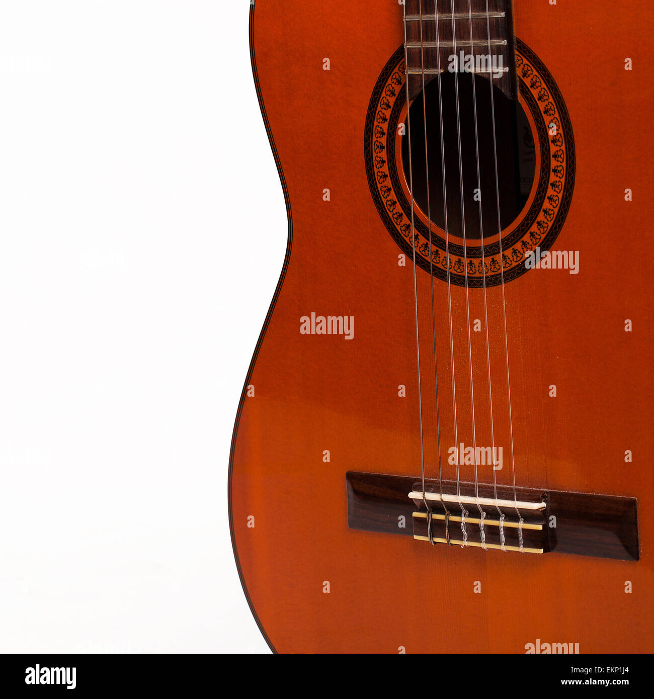Old wooden guitar over white background Stock Photo - Alamy