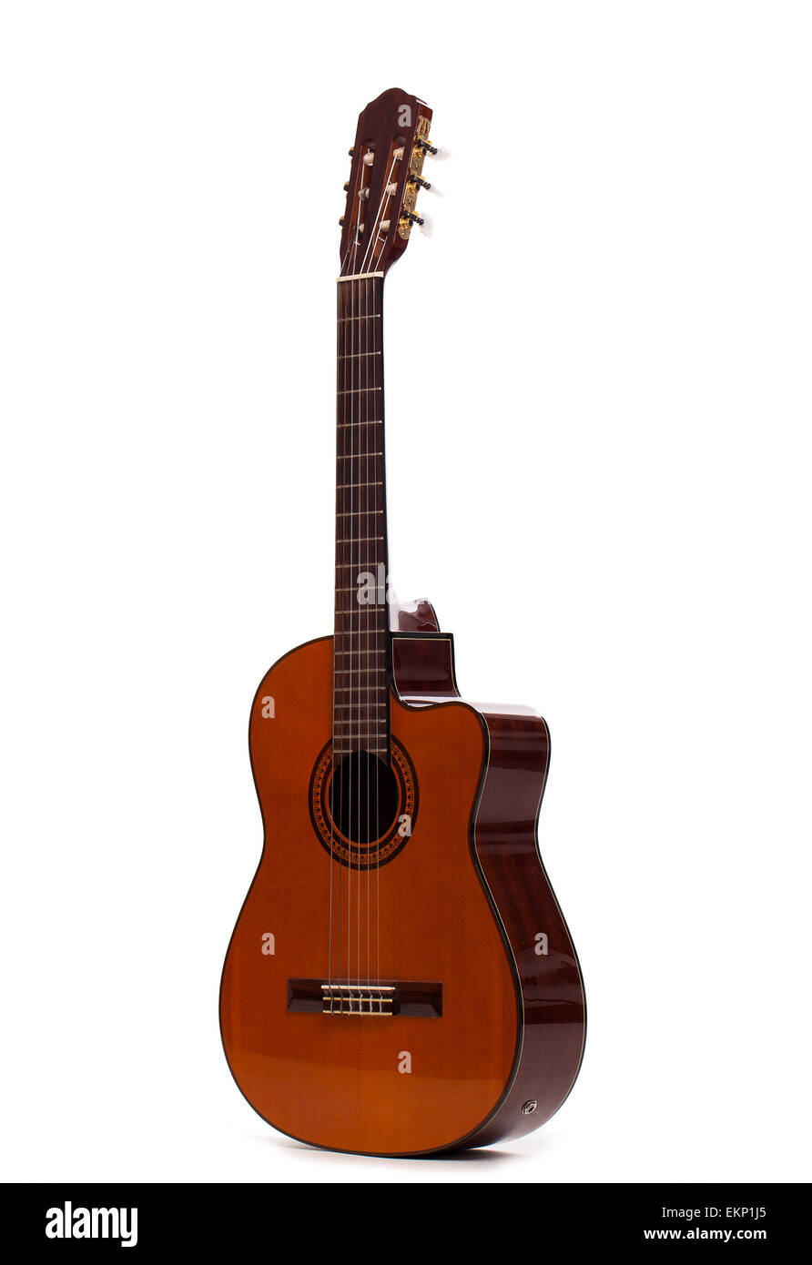 Old wooden guitar isolated over background Stock Photo - Alamy