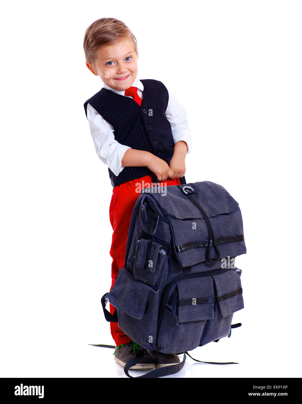 Smiling young schoolboy with backpack hi-res stock photography and ...