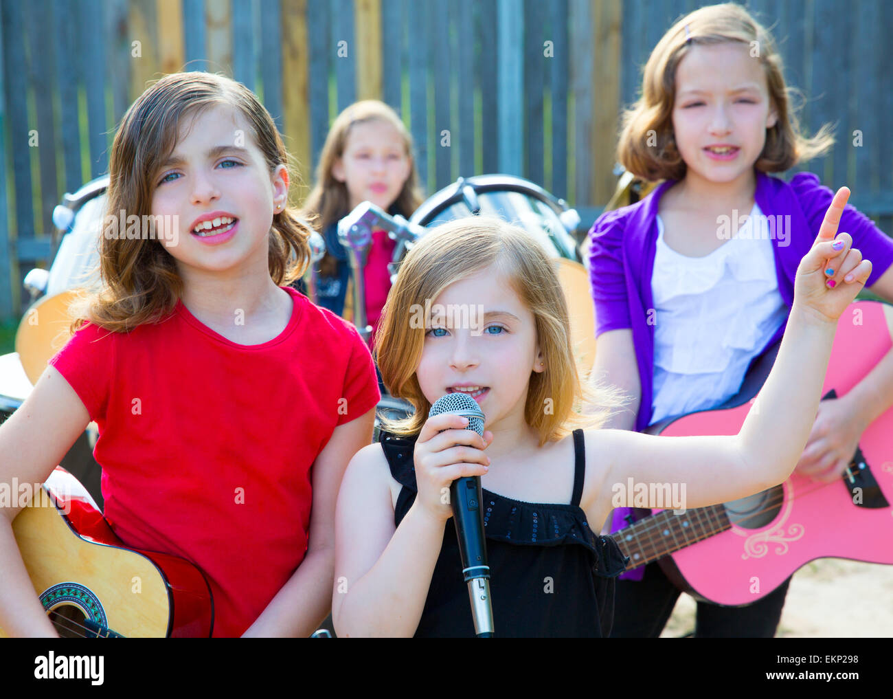 chidren singer girl singing playing live band in backyard Stock Photo ...