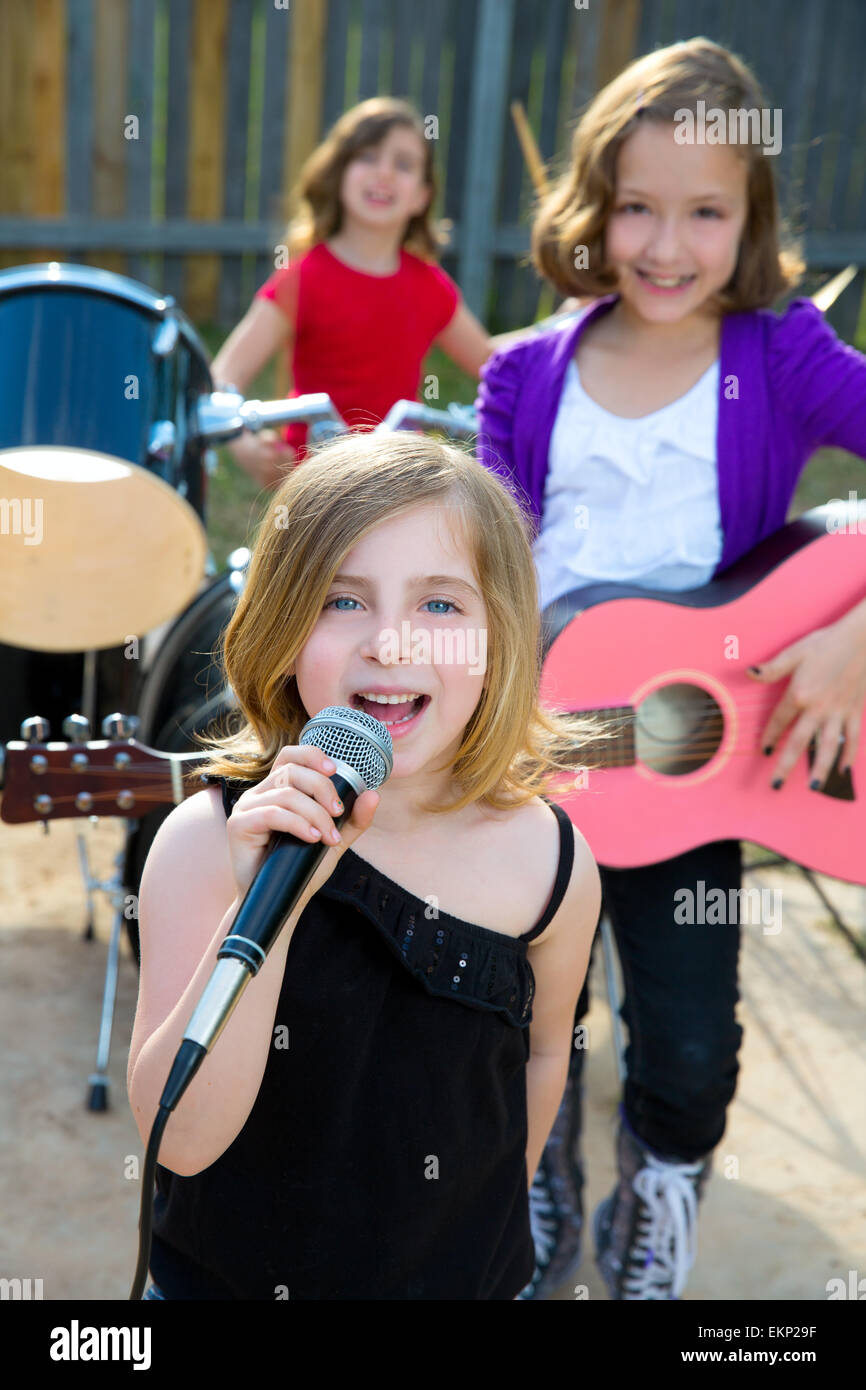 chidren singer girl singing playing live band in backyard Stock Photo ...