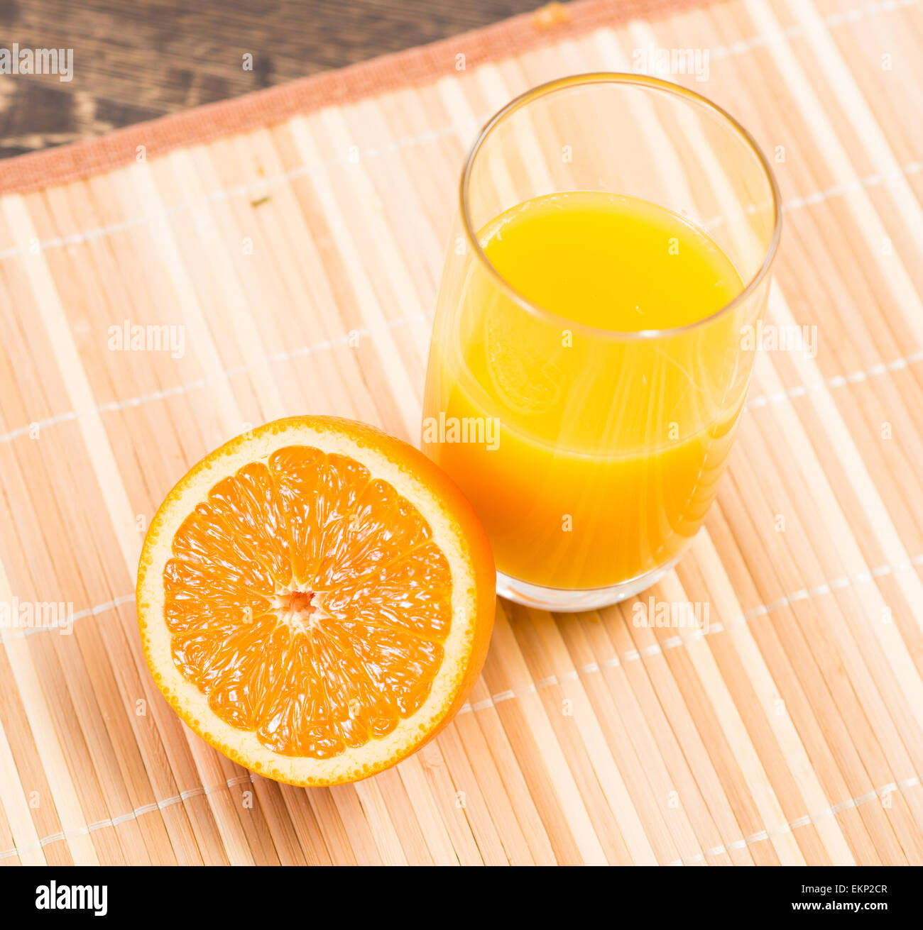 orange and a glass of orange juice Stock Photo - Alamy