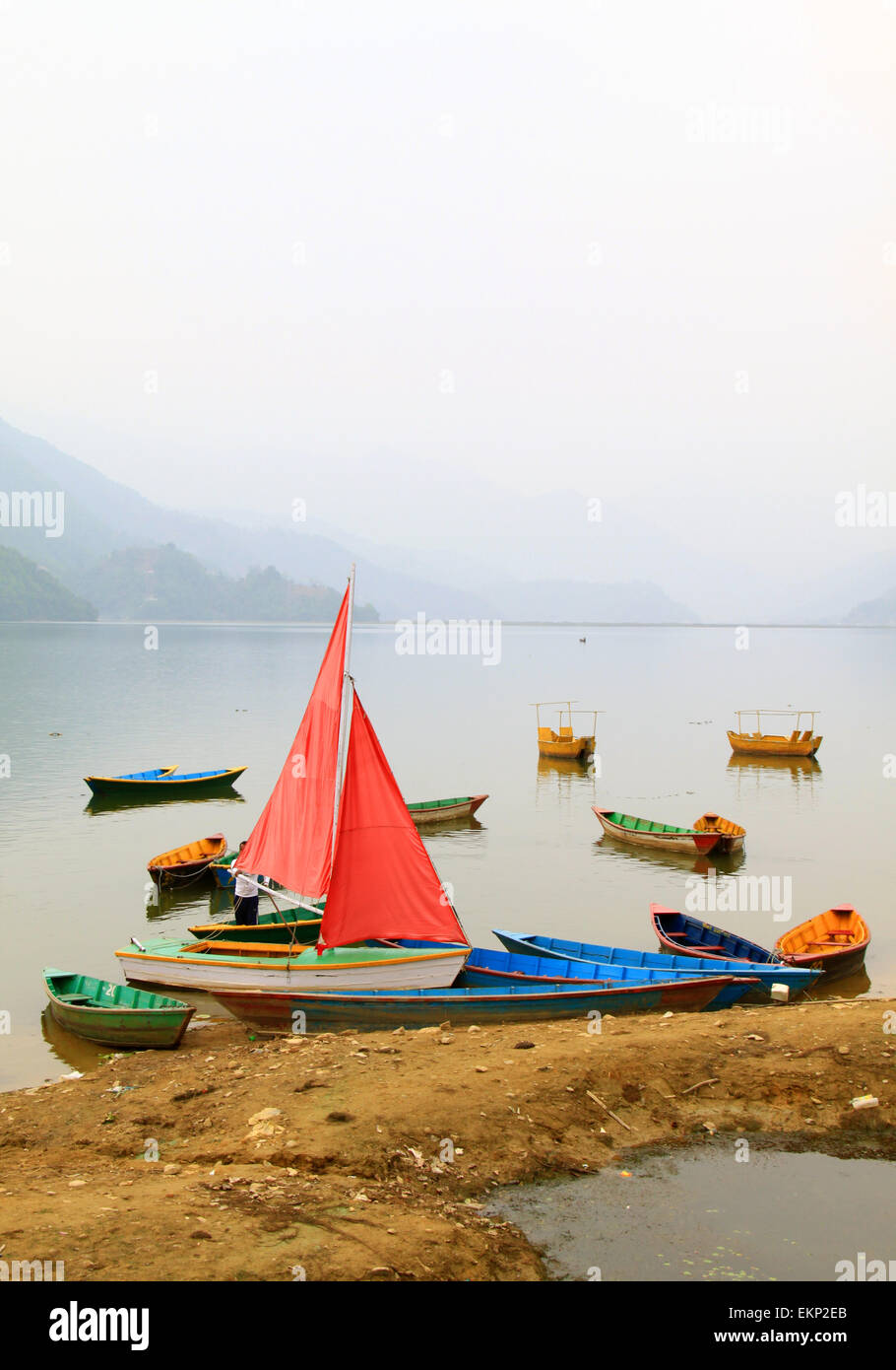 Boats on Phewa lake in Pokhara, Nepal Stock Photo - Alamy