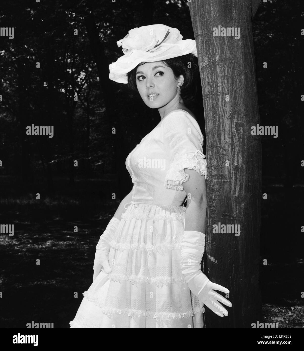 Actress and singer Susan Maughan, aged 20, photographed in a park near ...