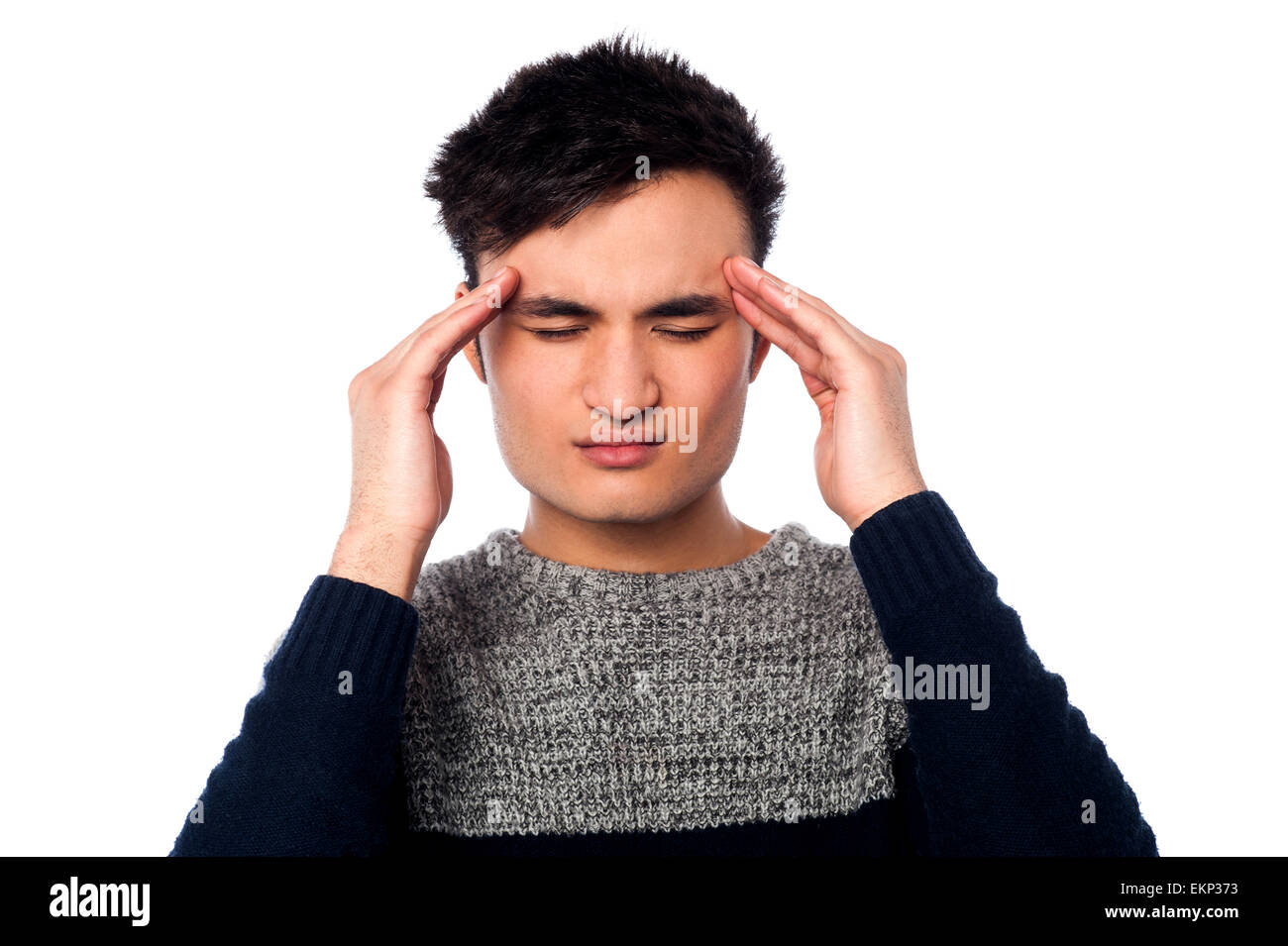 Young guy having headache Stock Photo - Alamy