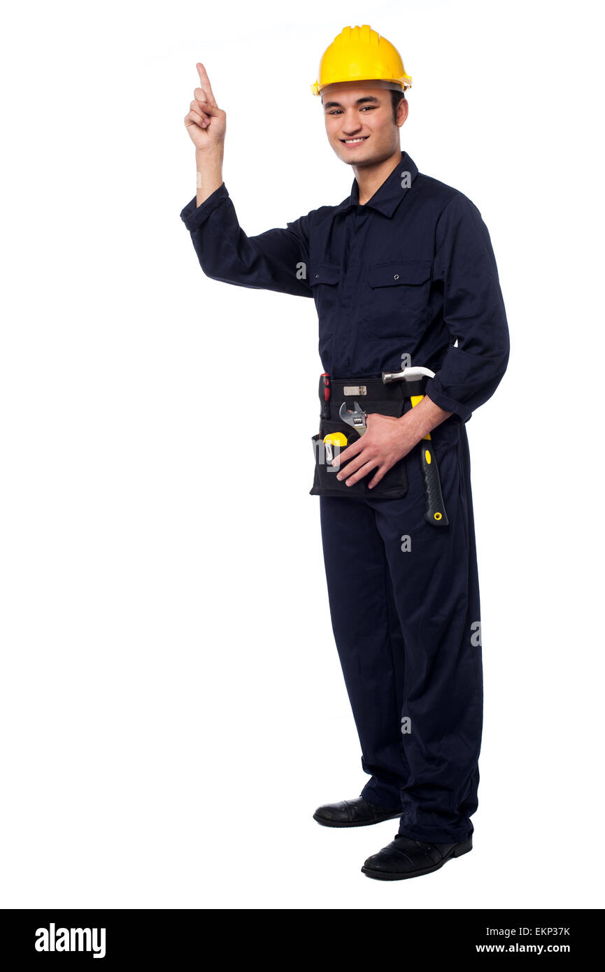 Construction worker pointing upwards Stock Photo - Alamy