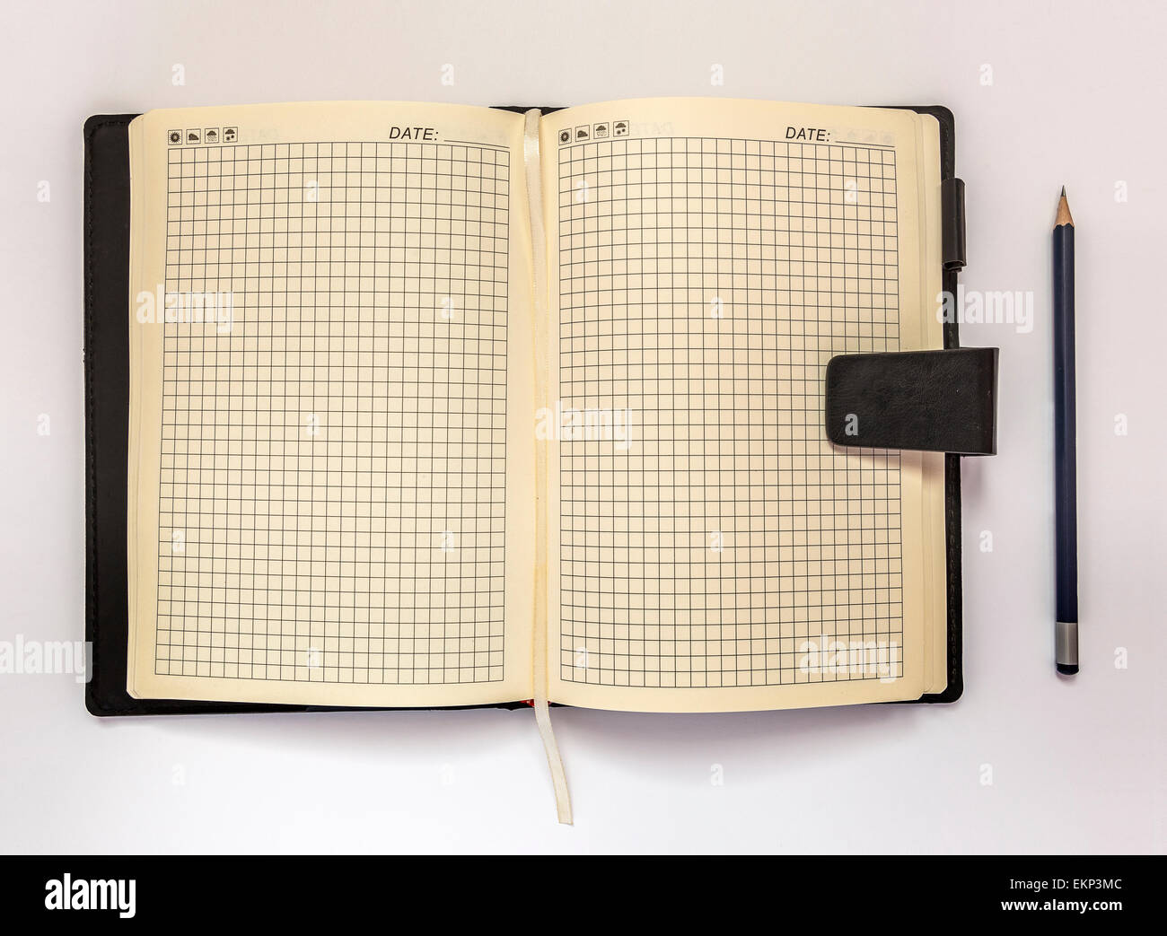 Diary and pencil on a white background Stock Photo - Alamy