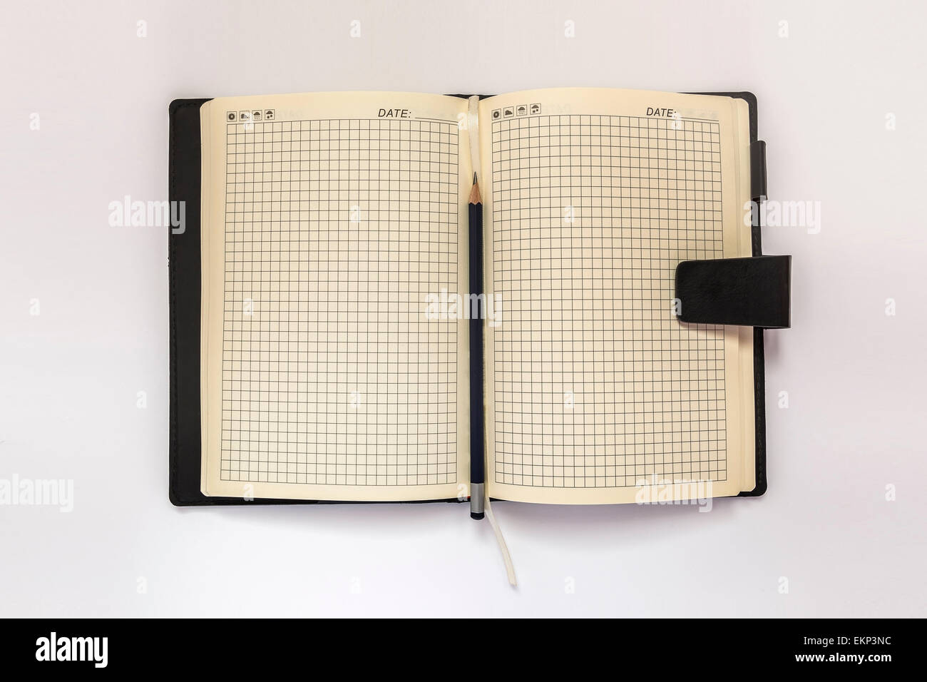 Diary and pencil on a white background Stock Photo - Alamy