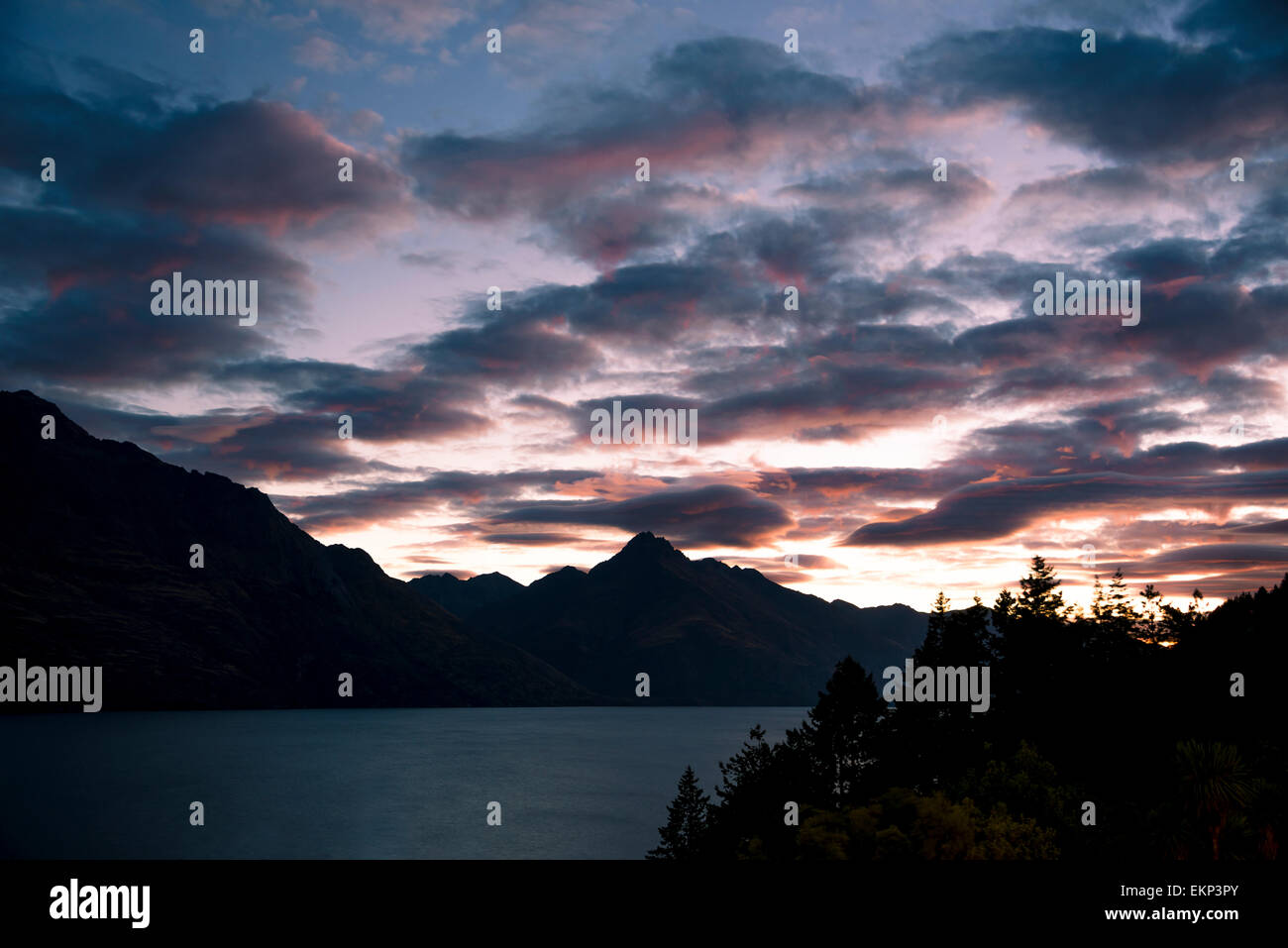 Sunset over Cecil Peak and Walter Peak, Queenstown, south island, New ...