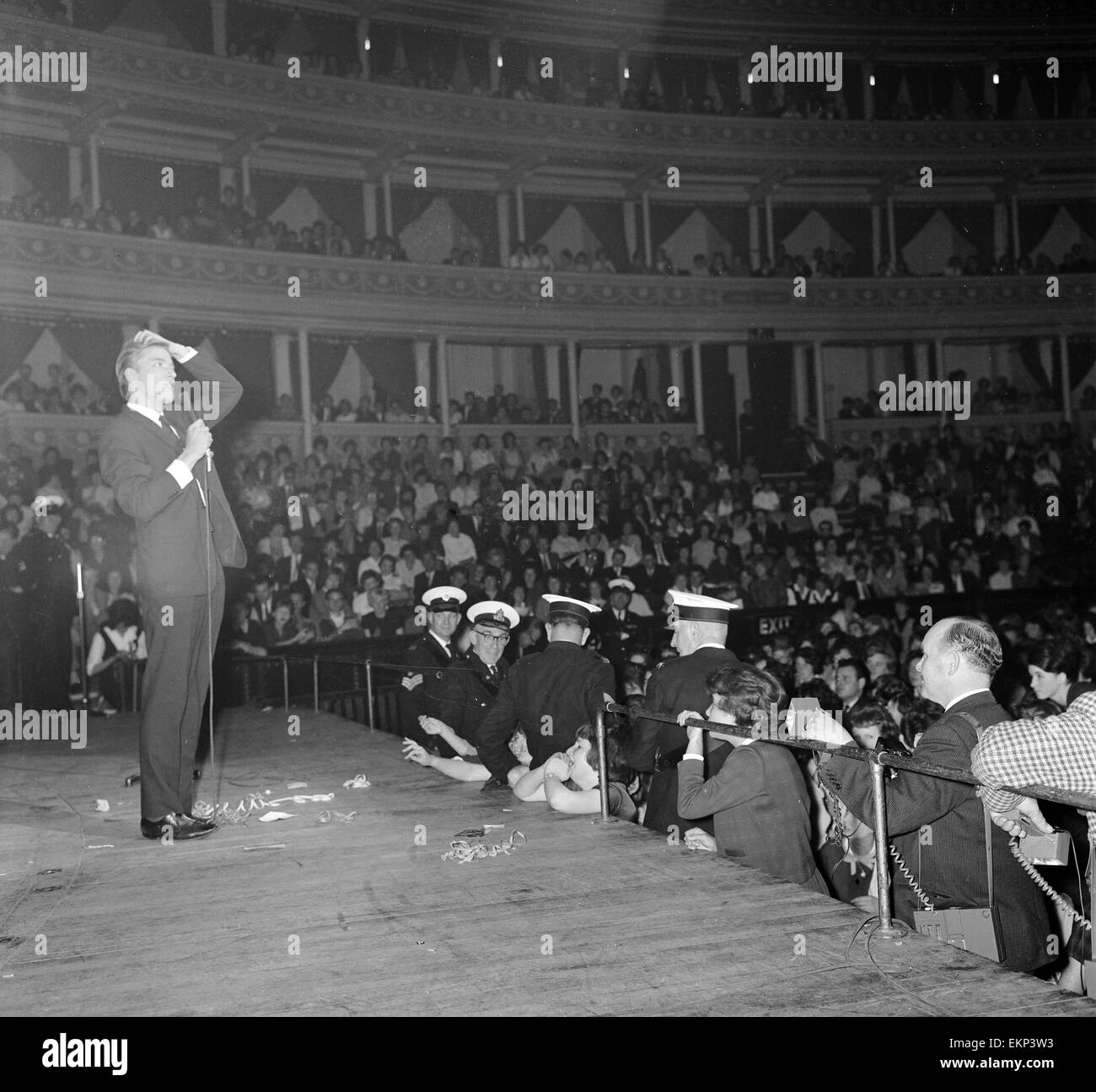 British pop singer Mike Sarne performing on stage at the Pop Prom at ...