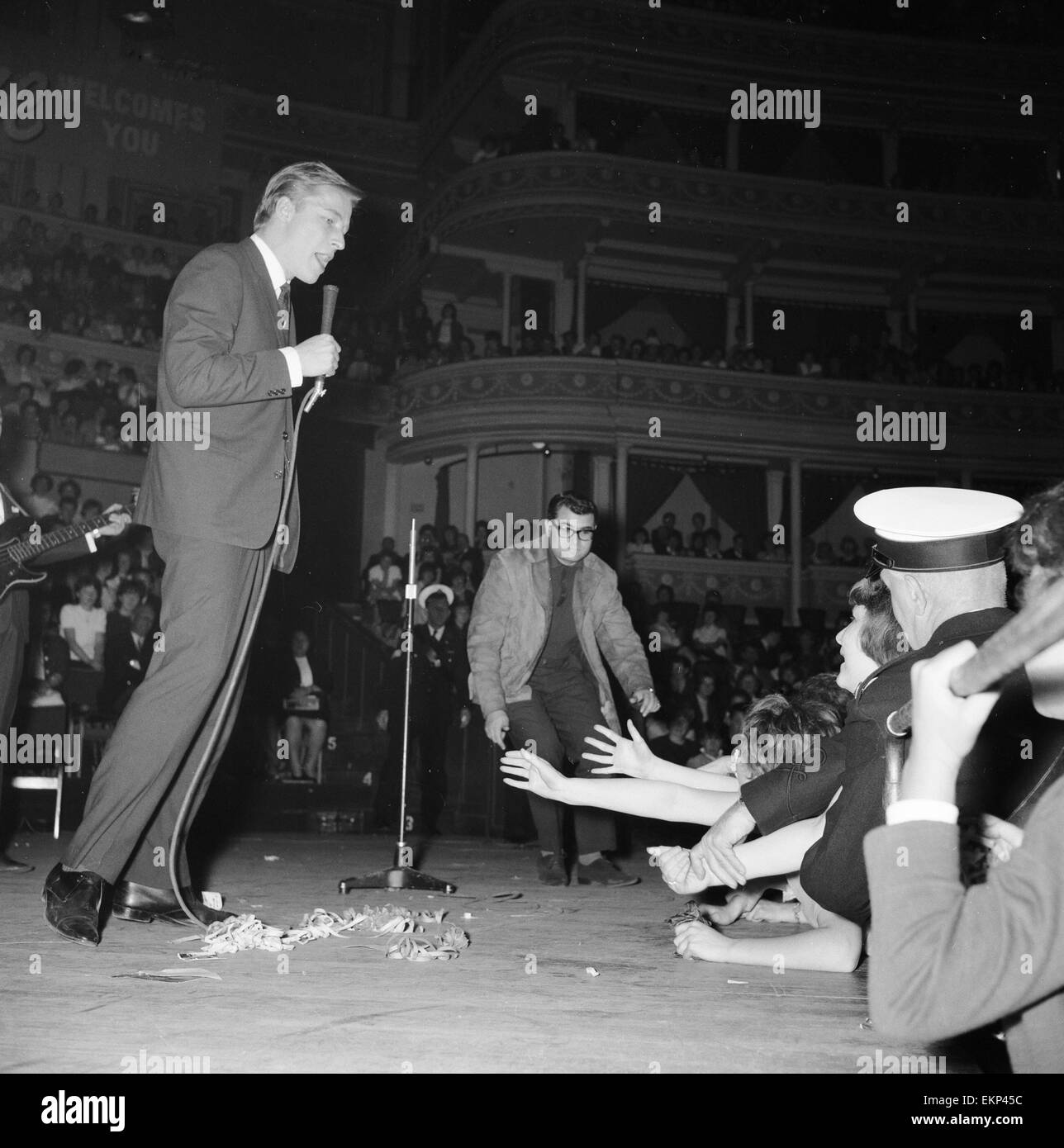 British pop singer Mike Sarne performing on stage at the Pop Prom at ...