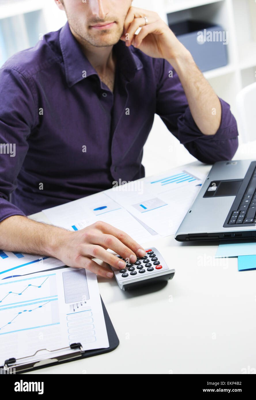 business man analyzing financial data Stock Photo - Alamy