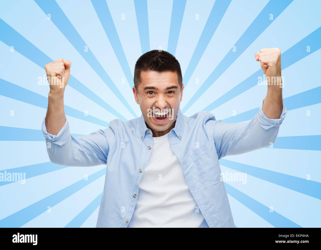 happy laughing man with raised hands Stock Photo - Alamy