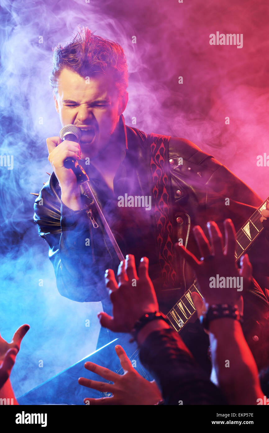 Boy singing stage hi-res stock photography and images - Alamy