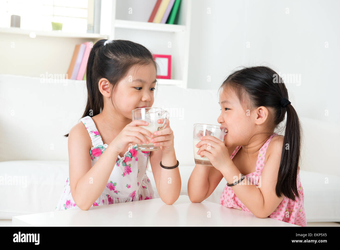 Children drinking milk Stock Photo - Alamy